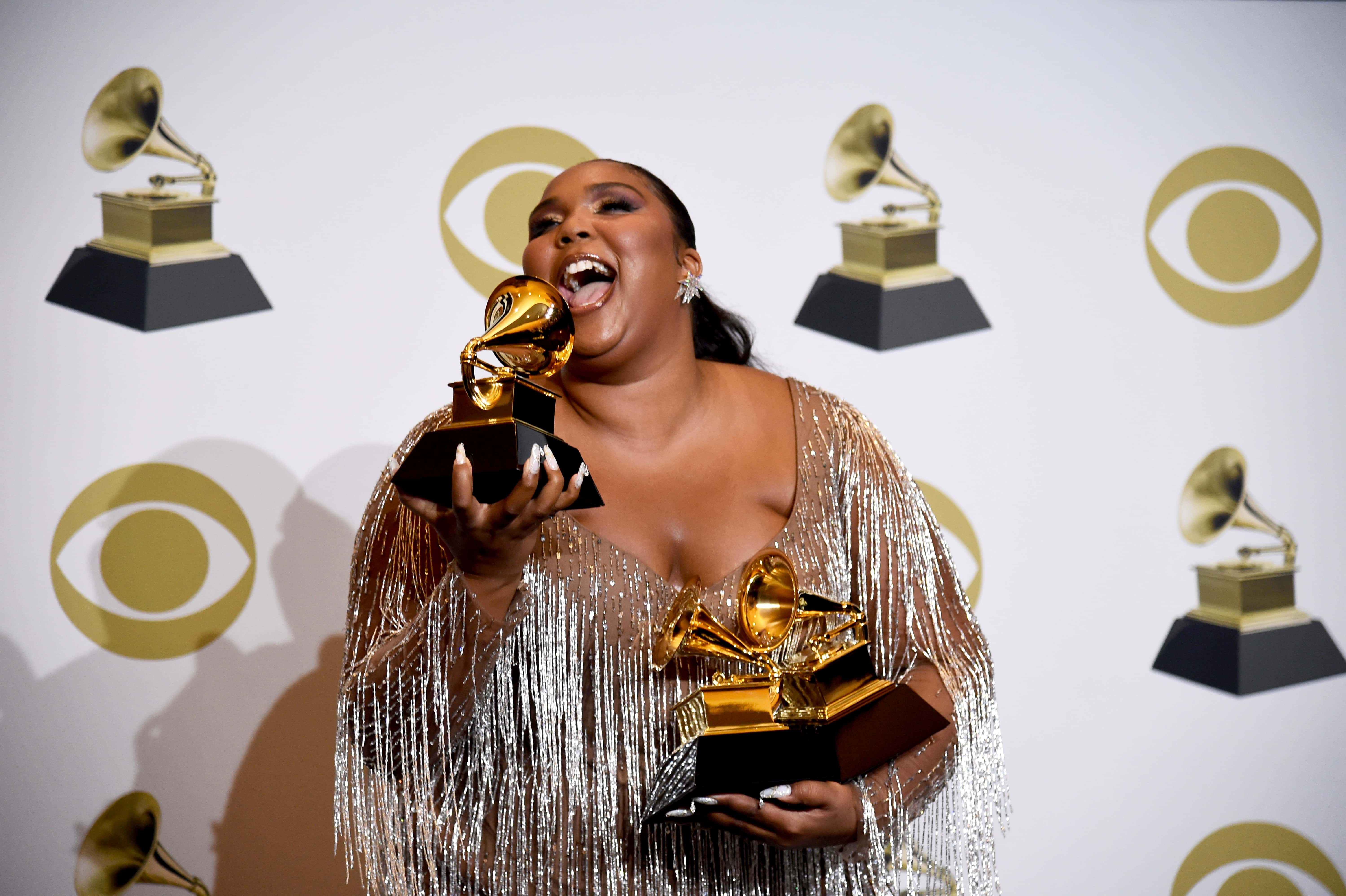 Lizzo shares new song urging people to vote, fans laud her for ...